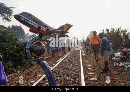 KENYA, Nairobi, Kibera slum, railway line, commuter train in the ...
