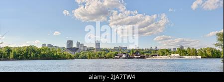 Panorama of Dnepropetrovsk from rowing channel towards buildings on top ...