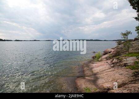 The rocky banks of the Saint Lawrence River on Grindstone Island Stock ...
