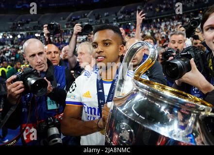 Real Madrid's de Goes Rodrygo with the UEFA Champions League trophy ...
