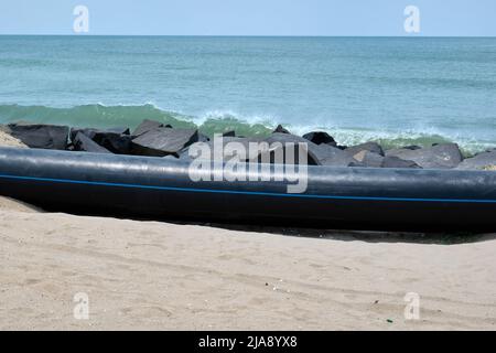 Sea water intake pipe at the beach Stock Photo - Alamy