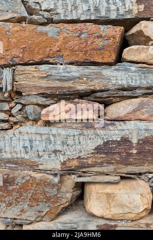 Rectangular stone wall in ocher tones Stock Photo - Alamy