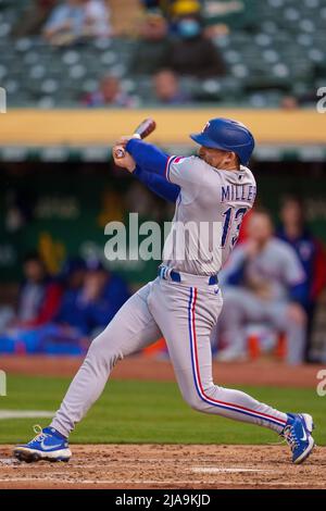 Texas Rangers left fielder Brad Miller (13) swings at a pitch during ...