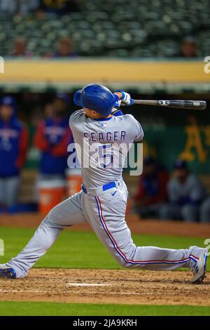 Texas Rangers' Corey Seager swings through a pitch from the Kansas City ...