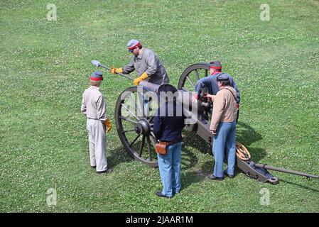 Civil War re-enactors fire a cannon at Fort Macon, originally ...