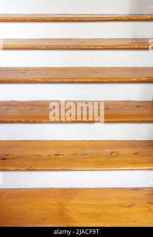 Vintage wooden stair with brown plank tread and white riser. Interior ...