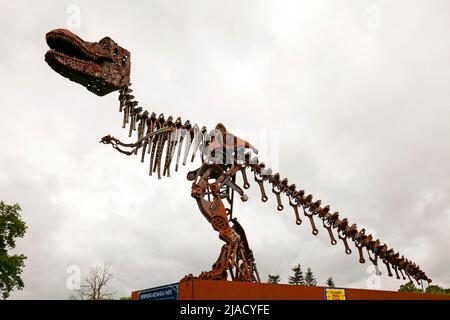 Tyrannosaurus rex T-rex sculpture made of metal gears and parts in ...