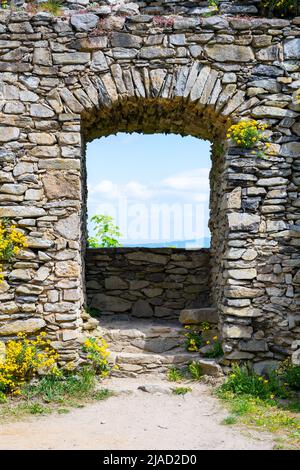 Old castle wall ruins. Caste window and church. Ruins of castle ...
