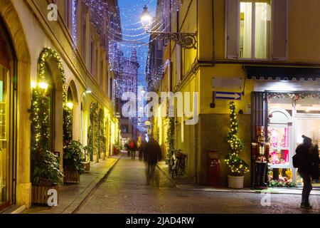 Streets of night Parma with Christmas illumination in Italy outdoor ...