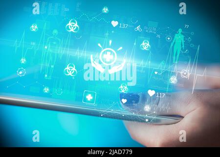 Close-up of a touchscreen with healthcare icons Stock Photo - Alamy