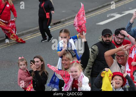 An Everton fan joins in the celebrations as the Liverpool FC squad make ...