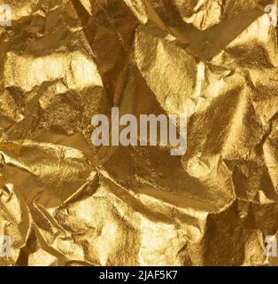 Close up of gold paper wrinkled background texture Stock Photo - Alamy