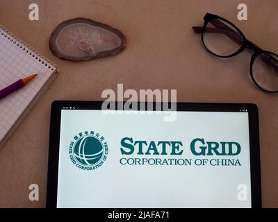 Illustration State Grid (logo) is seen on the screen in Paris on ...