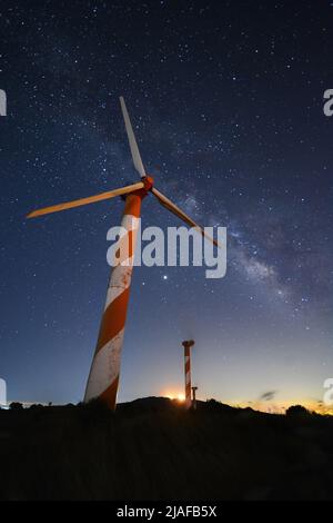 Wind turbine at night and the milky way Stock Photo - Alamy