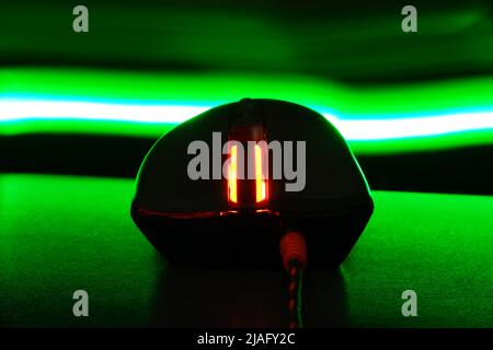 Computer mouse glows in the dark Stock Photo - Alamy