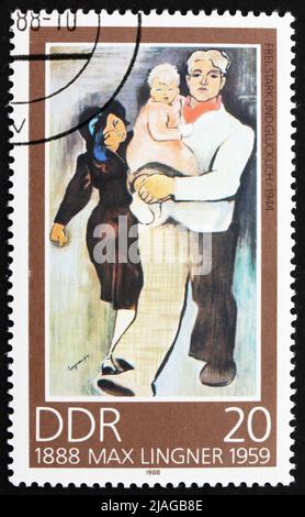 GDR - CIRCA 1988: a stamp printed in GDR shows Handball, 24th Summer ...