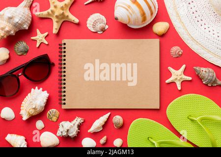 Blank writing book with summer beach accessories on background, copy ...