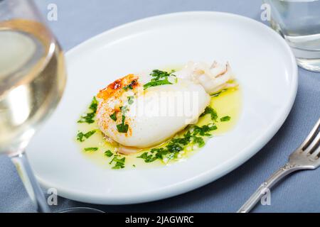 Fried sepia with green sauce of olive oil with garlic and parsley Stock ...