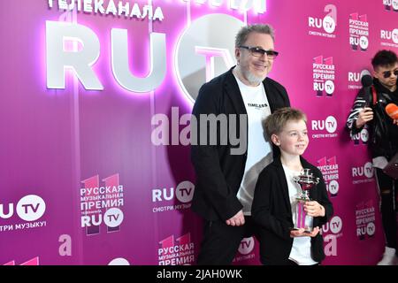 Moscow. The singer Vladimir Presnyakov Jr. with the son at a ceremony ...