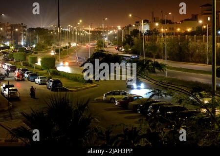 Giza, Egypt, May 19 2022: the moving vehicles and cars at night on the ...