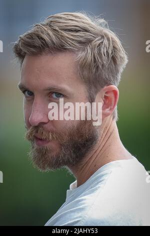 Scottish DJ Calvin Harris performing for the Liverpool FC open top bus ...