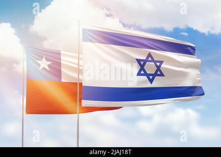 Israel and Chile flags waving together on blue cloudy sky, two country ...