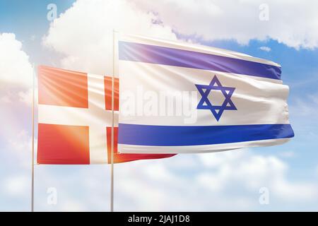 Israel and Denmark flags waving together on blue cloudy sky, two ...