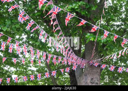 British flags hanging on the streets of London. Union jack flag ...