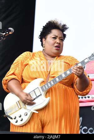 Singer, songwriter and guitarist Celisse is shown performing on stage ...