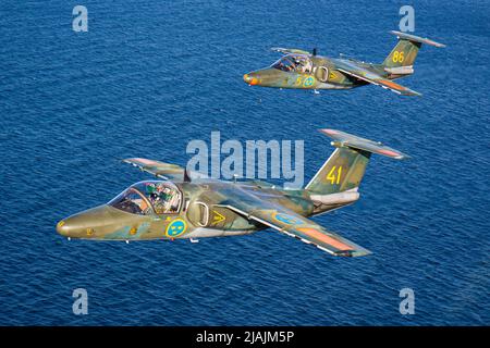 A pair of Swedish Air Force Sk60 training jets on a formation flight ...