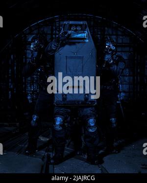 Police forces and members of special forces of riot police in uniforms ...