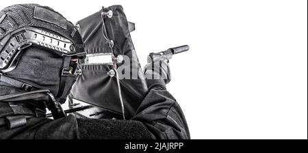 SWAT team fighter hiding behind ballistic shield and aiming pistol ...