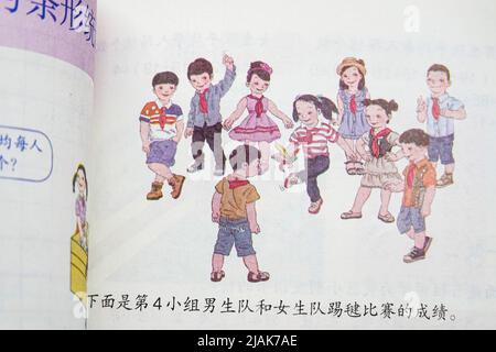 On the inner page of the textbook, there is an illustration of a little ...