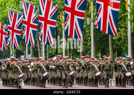 The Band of HM Royal Marines march through Plymouth's Royal William ...