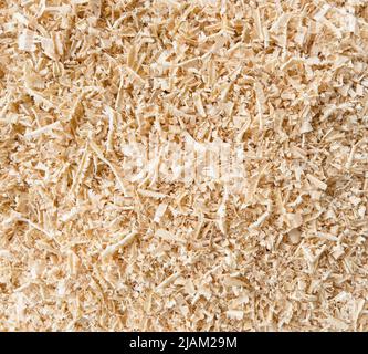 Sawdust or wood dust texture background Stock Photo - Alamy