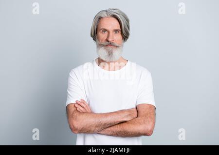 Photo of serious retired man wear trendy pastel outfit two arm ...