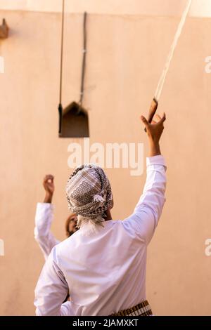 Traditional bedouin dance with sword at Qatar National Day in Doha ...