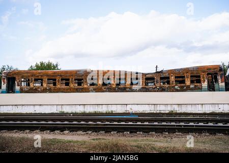 Exploded trains and wagons at the railway station in the city of ...