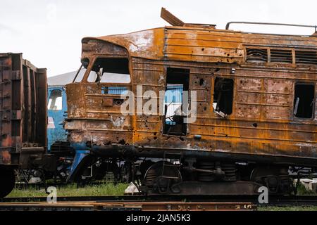 Exploded trains and wagons at the railway station in the city of ...