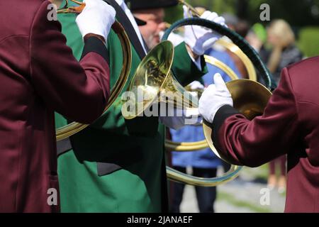 Close up of musicians playing the hunting horn Stock Photo - Alamy