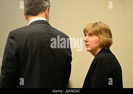Amber Heard's attorneys Elaine Bredehoft and Benjamin Rottenborn stand ...