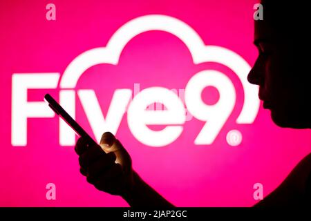 In this photo illustration, the Five9 Inc. logo is displayed on a ...
