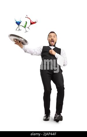 Waiter falling with cocktails on a tray isolated on white background ...