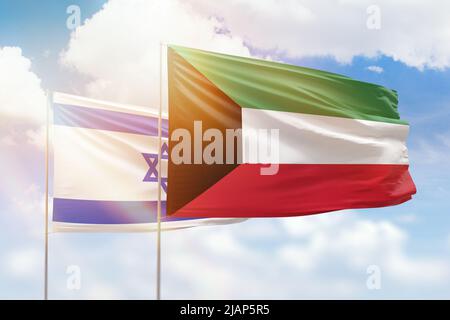 Kuwait and Israel flags waving together in the wind on blue cloudy sky ...