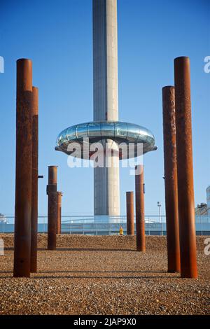 The i360 pod rising up its supporting tower, Brighton. Structural pylon ...
