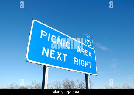 Picnic sign sat off ramp on freeway with wheelchair accessible ...