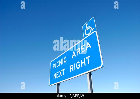 Picnic sign sat off ramp on freeway with wheelchair accessible ...