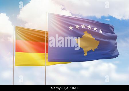Sunny blue sky and flags of germany and costa rica Stock Photo - Alamy
