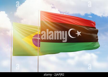Sunny blue sky and flags of brazil and nato Stock Photo - Alamy