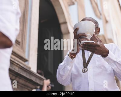 People at the religious Mass of Santo Antonio de Categero in Rosario ...